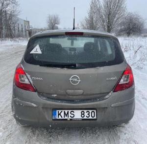 Brown Opel Corsa 2011 in Kaunas, with an engine capacity of 1.25 L and mileage of 223 thousand km for 2100 €, photo 5 on AUTOMOTO.COM.LV