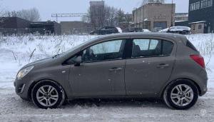 Brown Opel Corsa 2011 in Kaunas, with an engine capacity of 1.25 L and mileage of 223 thousand km for 2100 €, photo 7 on AUTOMOTO.COM.LV