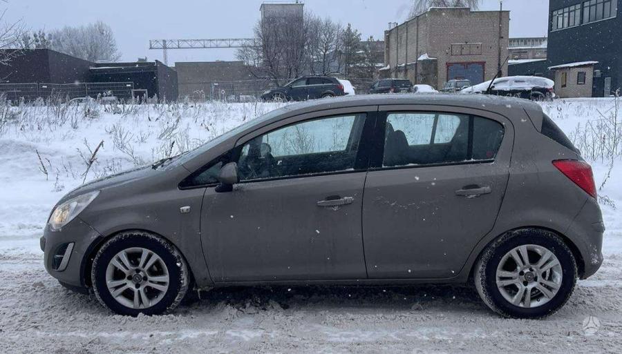 Brown Opel Corsa 2011 in Kaunas, with an engine capacity of 1.25 L and mileage of 223 thousand km for 2100 €, photo 7 on AUTOMOTO.COM.LV
