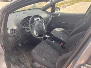 Brūns Opel Corsa 2013 Kauņa, ar dzinēja tilpumu 1.23 L un nobraukumu 76 tūkst. km par 3000 €, foto 5 vietnē AUTOMOTO.COM.LV