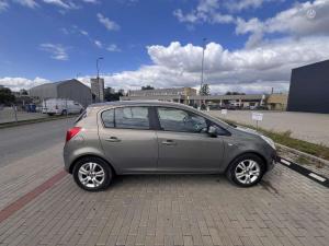 Brūns Opel Corsa 2013 Kauņa, ar dzinēja tilpumu 1.23 L un nobraukumu 76 tūkst. km par 3000 €, foto 13 vietnē AUTOMOTO.COM.LV