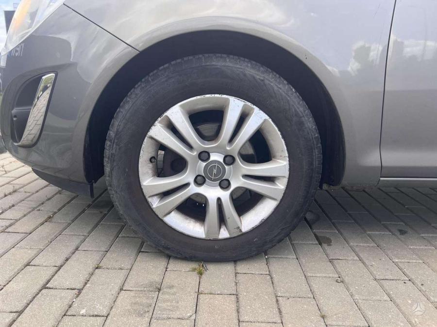 Brūns Opel Corsa 2013 Kauņa, ar dzinēja tilpumu 1.23 L un nobraukumu 76 tūkst. km par 3000 €, foto 18 vietnē AUTOMOTO.COM.LV