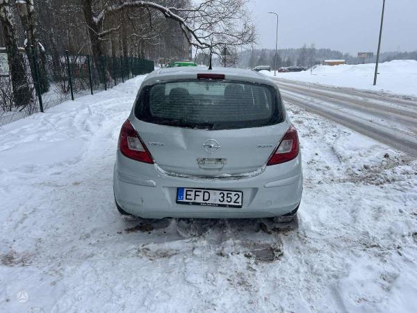 Green Opel Corsa 2008 in Vilnius, with an engine capacity of 1.25 L and mileage of 130 thousand km for 999 €, photo 5 on AUTOMOTO.COM.LV