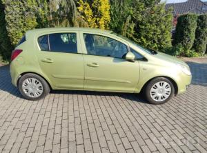 Green Opel Corsa 2008 in Riga, with an engine capacity of 1.40 L and mileage of 274 thousand km for 1100 €, photo 3 on AUTOMOTO.COM.LV