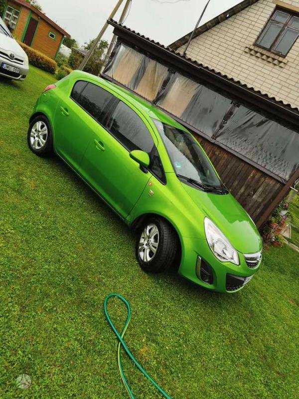 Green Opel Corsa 2011 in Akmene, with an engine capacity of 1.30 L and mileage of 242 thousand km for 2100 €, photo 8 on AUTOMOTO.COM.LV
