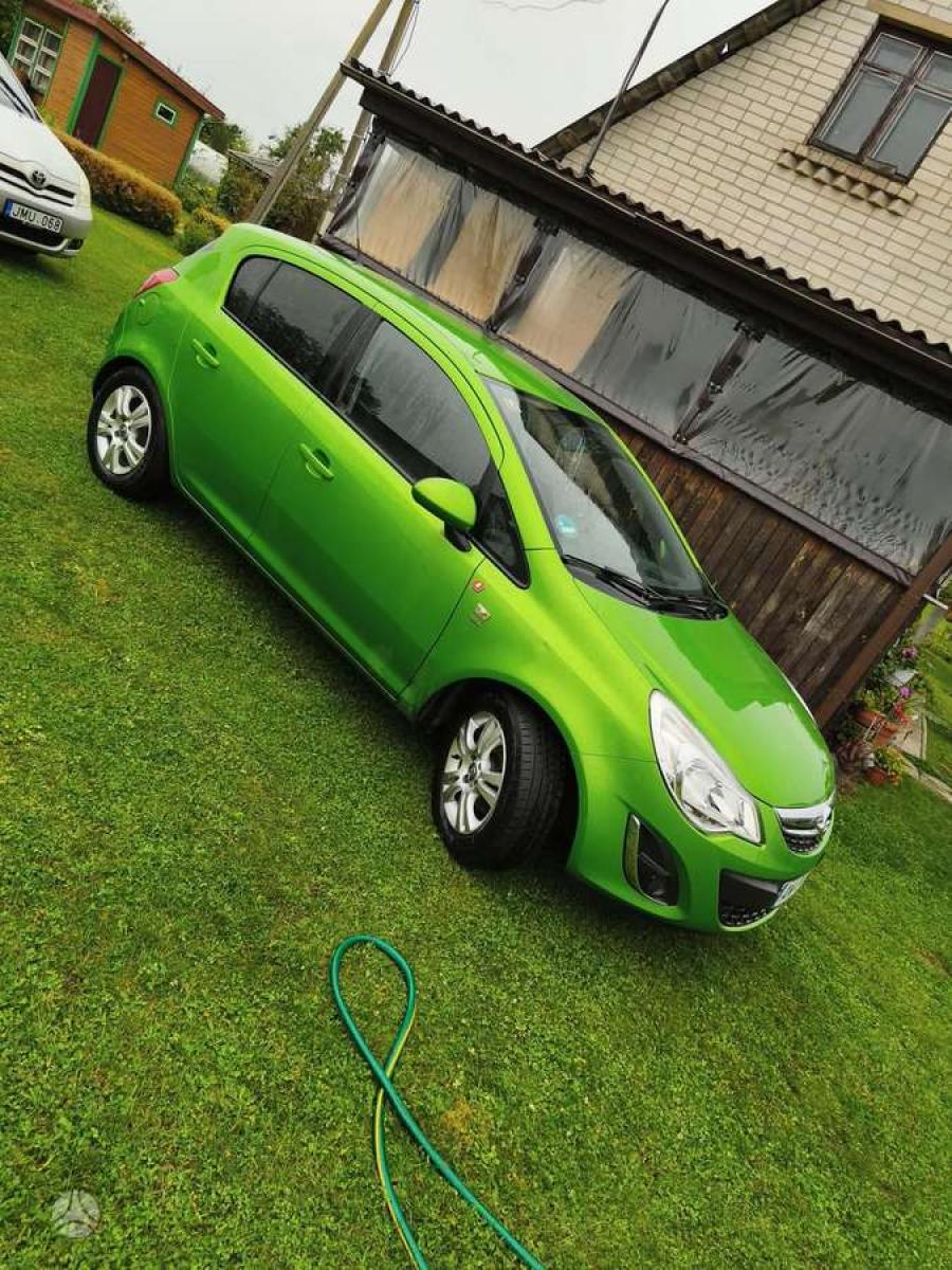Green Opel Corsa 2011 in Akmene, with an engine capacity of 1.30 L and mileage of 242 thousand km for 2100 €, photo 8 on AUTOMOTO.COM.LV