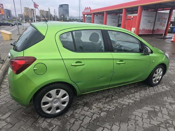 Green Opel Corsa 2015 in Kaunas, with an engine capacity of 1.25 L and mileage of 166 thousand km for 4100 €, photo 3 on AUTOMOTO.COM.LV