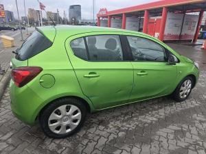 Green Opel Corsa 2015 in Kaunas, with an engine capacity of 1.25 L and mileage of 166 thousand km for 4100 €, photo 3 on AUTOMOTO.COM.LV