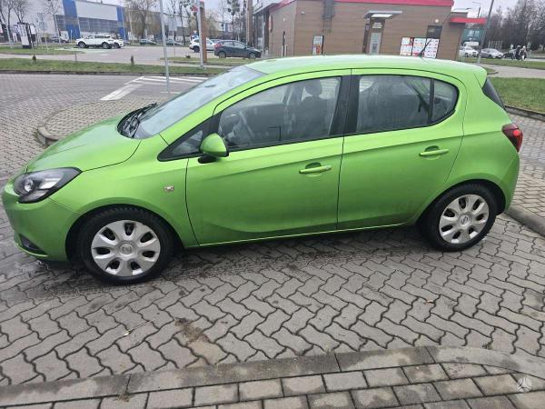 Green Opel Corsa 2015 in Kaunas, with an engine capacity of 1.25 L and mileage of 166 thousand km for 4100 €, photo 6 on AUTOMOTO.COM.LV