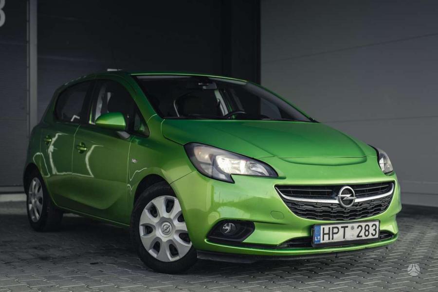 Green Opel Corsa 2015 in Vilnius, with an engine capacity of 1.25 L and mileage of 169 thousand km for 4450 €, photo 1 on AUTOMOTO.COM.LV