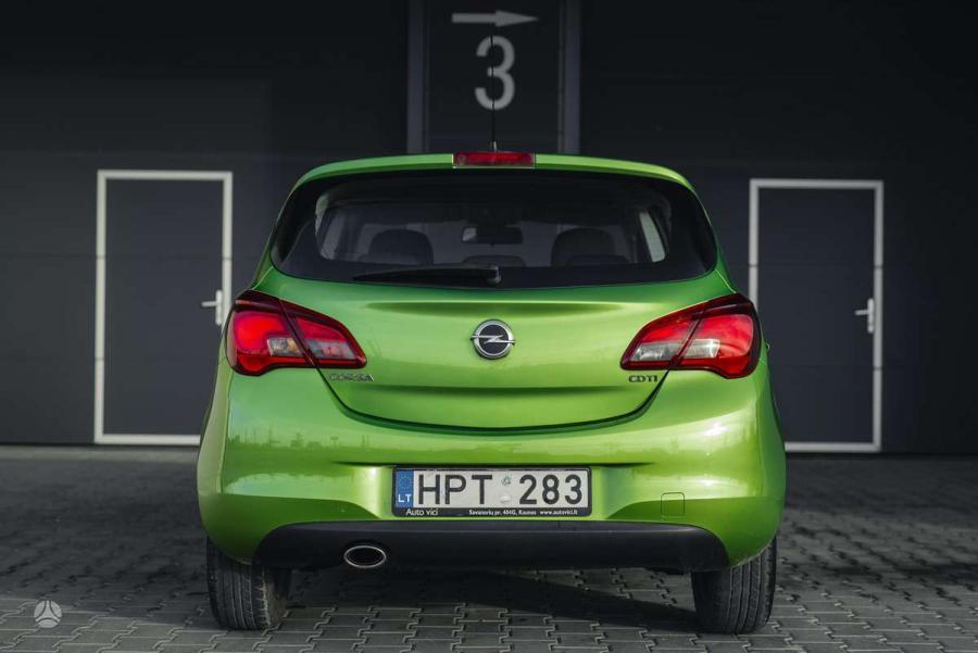 Green Opel Corsa 2015 in Vilnius, with an engine capacity of 1.25 L and mileage of 169 thousand km for 4450 €, photo 9 on AUTOMOTO.COM.LV
