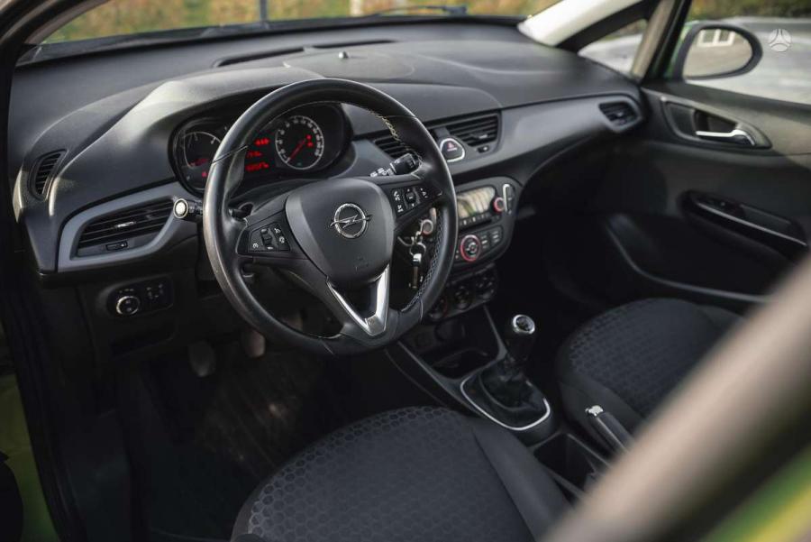 Green Opel Corsa 2015 in Vilnius, with an engine capacity of 1.25 L and mileage of 169 thousand km for 4450 €, photo 12 on AUTOMOTO.COM.LV