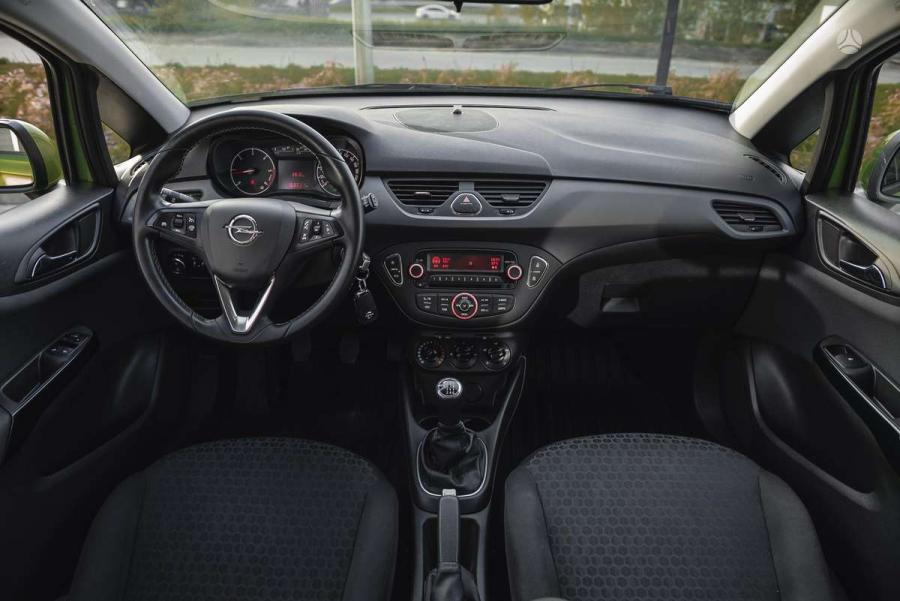 Green Opel Corsa 2015 in Vilnius, with an engine capacity of 1.25 L and mileage of 169 thousand km for 4450 €, photo 13 on AUTOMOTO.COM.LV