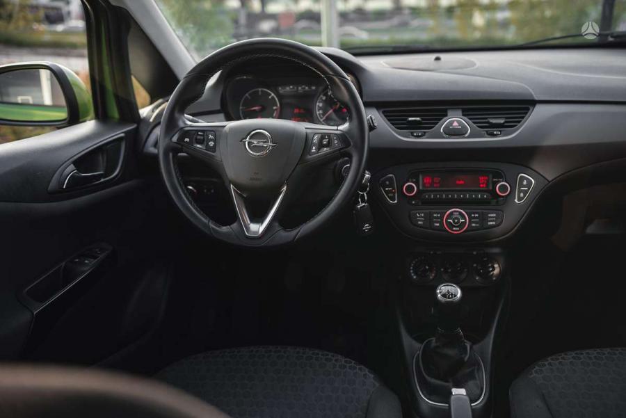 Green Opel Corsa 2015 in Vilnius, with an engine capacity of 1.25 L and mileage of 169 thousand km for 4450 €, photo 14 on AUTOMOTO.COM.LV