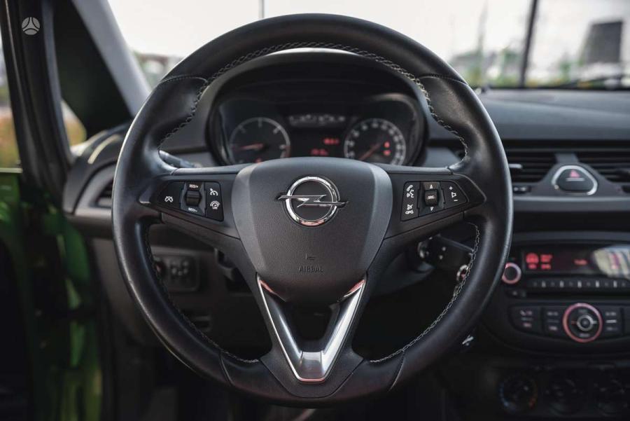 Green Opel Corsa 2015 in Vilnius, with an engine capacity of 1.25 L and mileage of 169 thousand km for 4450 €, photo 16 on AUTOMOTO.COM.LV