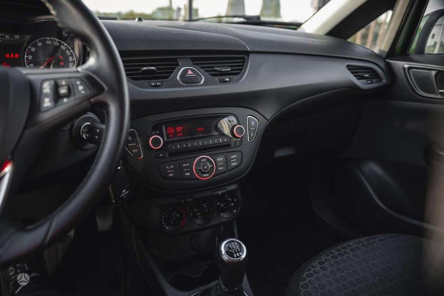 Green Opel Corsa 2015 in Vilnius, with an engine capacity of 1.25 L and mileage of 169 thousand km for 4450 €, photo 17 on AUTOMOTO.COM.LV