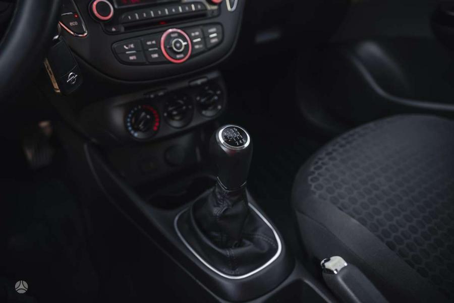 Green Opel Corsa 2015 in Vilnius, with an engine capacity of 1.25 L and mileage of 169 thousand km for 4450 €, photo 19 on AUTOMOTO.COM.LV