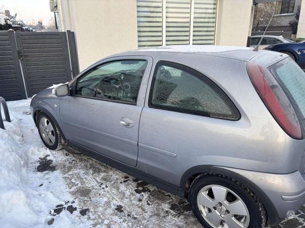 Pelēks Opel Corsa 2005 Kauņa, ar dzinēja tilpumu 1.00 L un nobraukumu 189 tūkst. km par 999 €, foto 4 vietnē AUTOMOTO.COM.LV