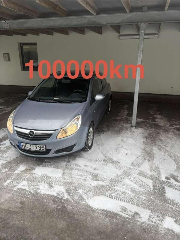 Grey Opel Corsa 2006 in Vilnius, with an engine capacity of 1.00 L and mileage of 100 thousand km for 899 €, photo 1 on AUTOMOTO.COM.LV
