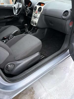 Pelēks Opel Corsa 2006 Viļņa, ar dzinēja tilpumu 1.00 L un nobraukumu 100 tūkst. km par 899 €, foto 8 vietnē AUTOMOTO.COM.LV