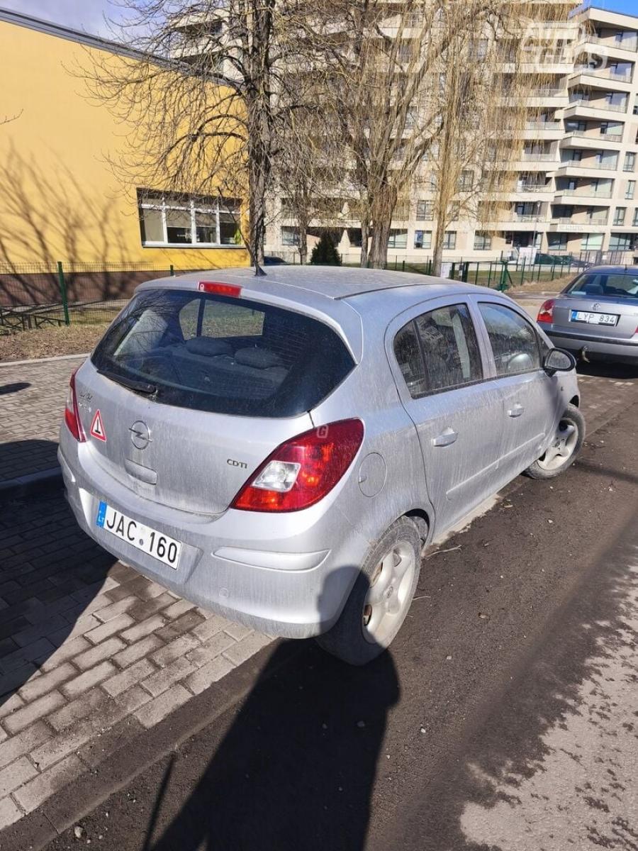 Grey Opel Corsa 2006 in Kaunas, with an engine capacity of 1.20 L and mileage of 215 thousand km for 550 €, photo 4 on AUTOMOTO.COM.LV