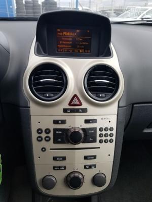Grey Opel Corsa 2006 in Kaunas, with an engine capacity of 1.20 L and mileage of 98 thousand km for 1499 €, photo 14 on AUTOMOTO.COM.LV