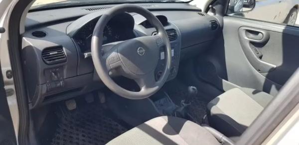 Pelēks Opel Corsa 2006 Valmiera, ar dzinēja tilpumu 1.40 L un nobraukumu 142 tūkst. km par 1500 €, foto 10 vietnē AUTOMOTO.COM.LV