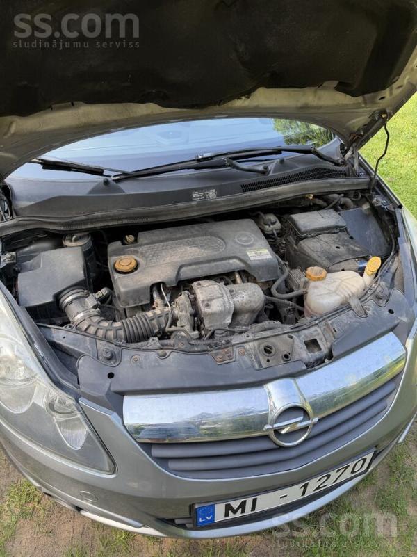 Grey Opel Corsa 2010 in Ogre, with an engine capacity of 1.30 L and mileage of 360 thousand km for 1300 €, photo 9 on AUTOMOTO.COM.LV