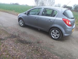 Grey Opel Corsa 2011 in Vilnius, with an engine capacity of 1.30 L and mileage of 2 thousand km for 600 €, photo 4 on AUTOMOTO.COM.LV