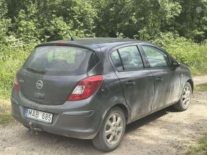 Grey Opel Corsa 2011 in Moletai, with an engine capacity of 1.23 L and mileage of 210 thousand km for 700 €, photo 4 on AUTOMOTO.COM.LV