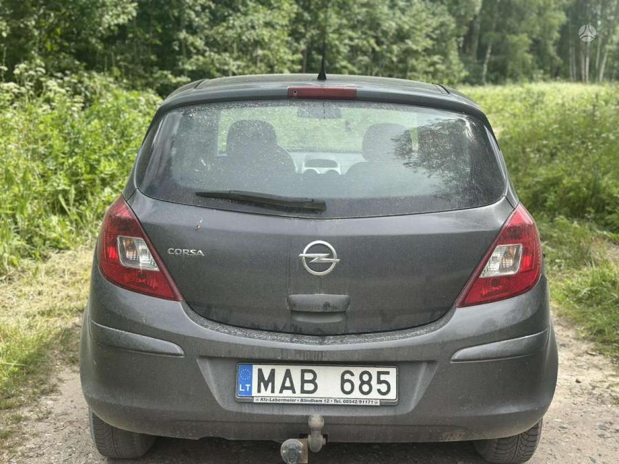 Grey Opel Corsa 2011 in Moletai, with an engine capacity of 1.23 L and mileage of 210 thousand km for 700 €, photo 5 on AUTOMOTO.COM.LV