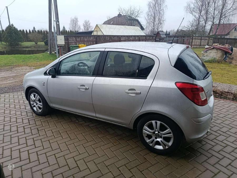 Grey Opel Corsa 2012 in Utena, with an engine capacity of 1.25 L and mileage of 340 thousand km for 2100 €, photo 4 on AUTOMOTO.COM.LV