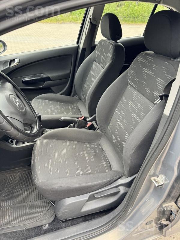 Grey Opel Corsa 2012 in Jurmala, with an engine capacity of 1.20 L and mileage of 227 thousand km for 1599 €, photo 8 on AUTOMOTO.COM.LV