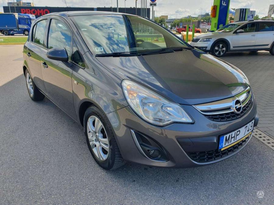 Grey Opel Corsa 2012 in Kaunas, with an engine capacity of 1.30 L and mileage of 201 thousand km for 2950 €, photo 4 on AUTOMOTO.COM.LV