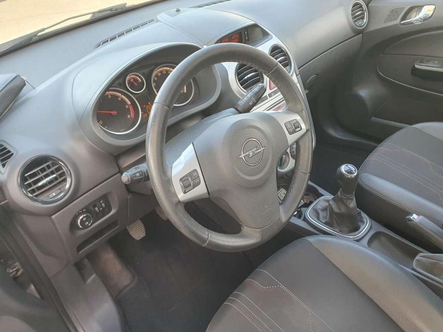 Grey Opel Corsa 2012 in Kaunas, with an engine capacity of 1.30 L and mileage of 201 thousand km for 2950 €, photo 9 on AUTOMOTO.COM.LV