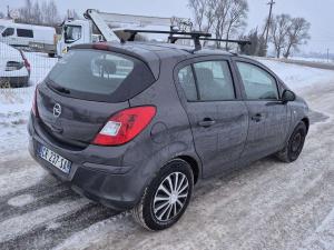 Grey Opel Corsa 2013 in Taurage, with an engine capacity of 1.23 L and mileage of 150 thousand km for 2300 €, photo 3 on AUTOMOTO.COM.LV