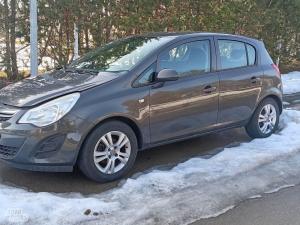 Grey Opel Corsa 2013 in Klaipeda, with an engine capacity of 1.20 L and mileage of 207 thousand km for 1299 €, photo 2 on AUTOMOTO.COM.LV