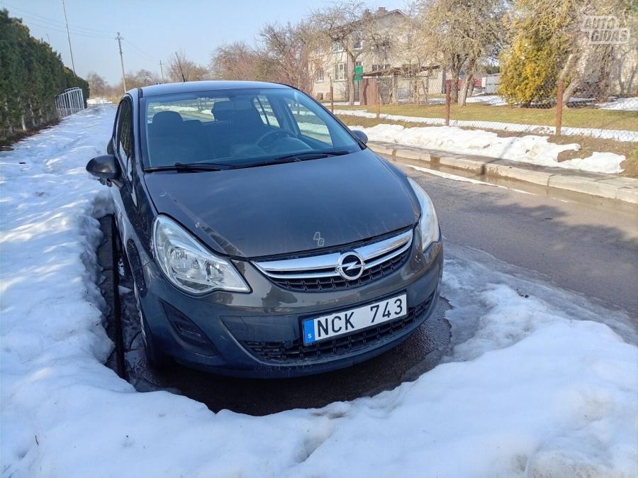 Grey Opel Corsa 2013 in Klaipeda, with an engine capacity of 1.20 L and mileage of 207 thousand km for 1299 €, photo 9 on AUTOMOTO.COM.LV