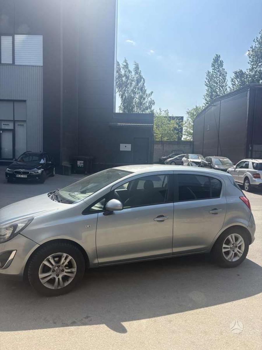 Grey Opel Corsa 2014 in Vilnius, with an engine capacity of 1.25 L and mileage of 201 thousand km for 1200 €, photo 3 on AUTOMOTO.COM.LV