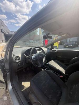 Grey Opel Corsa 2014 in Vilnius, with an engine capacity of 1.25 L and mileage of 201 thousand km for 1200 €, photo 11 on AUTOMOTO.COM.LV