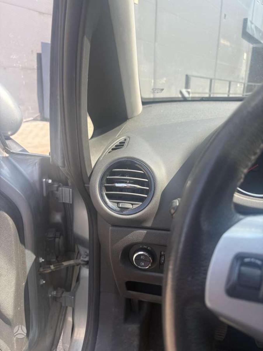 Grey Opel Corsa 2014 in Vilnius, with an engine capacity of 1.25 L and mileage of 201 thousand km for 1200 €, photo 14 on AUTOMOTO.COM.LV