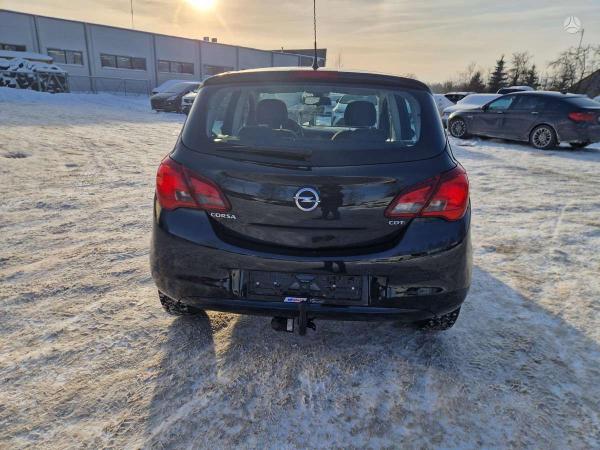 Grey Opel Corsa 2015 in Ukmerge, with an engine capacity of 1.25 L and mileage of 200 thousand km for 4349 €, photo 6 on AUTOMOTO.COM.LV