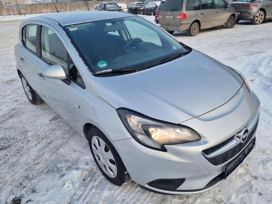 Grey Opel Corsa 2015 in Siauliai, with an engine capacity of 1.25 L and mileage of 260 thousand km for 3400 €, photo 1 on AUTOMOTO.COM.LV