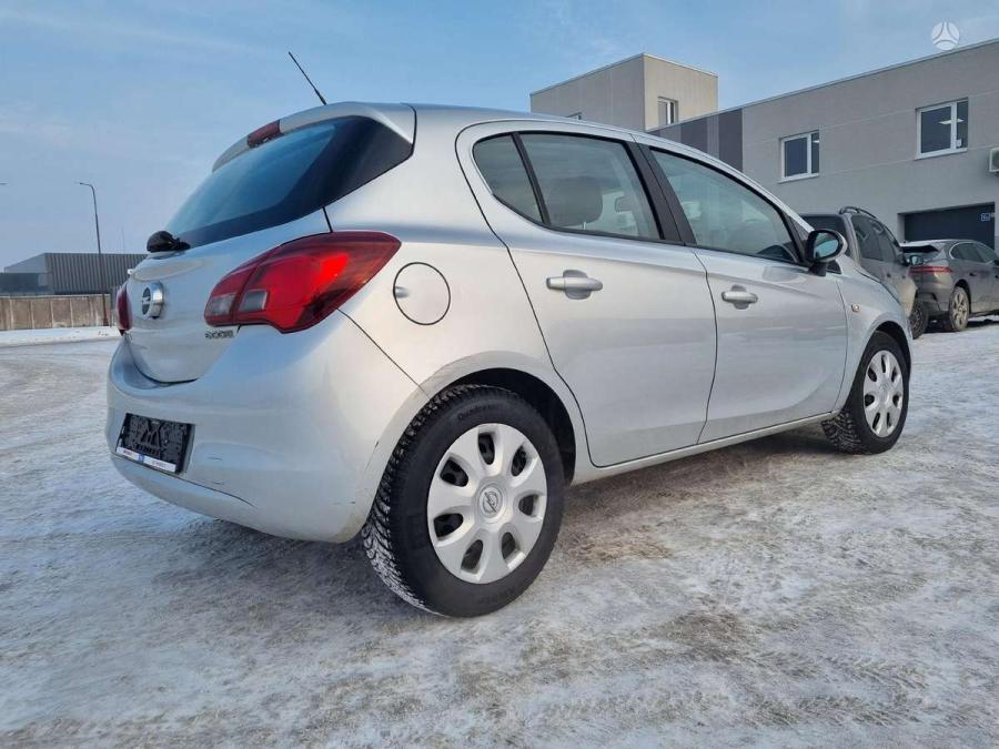 Grey Opel Corsa 2015 in Siauliai, with an engine capacity of 1.25 L and mileage of 260 thousand km for 3400 €, photo 11 on AUTOMOTO.COM.LV