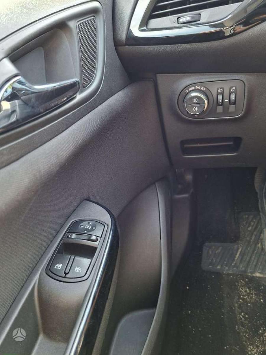 Grey Opel Corsa 2015 in Ukmerge, with an engine capacity of 1.23 L and mileage of 191 thousand km for 3950 €, photo 11 on AUTOMOTO.COM.LV