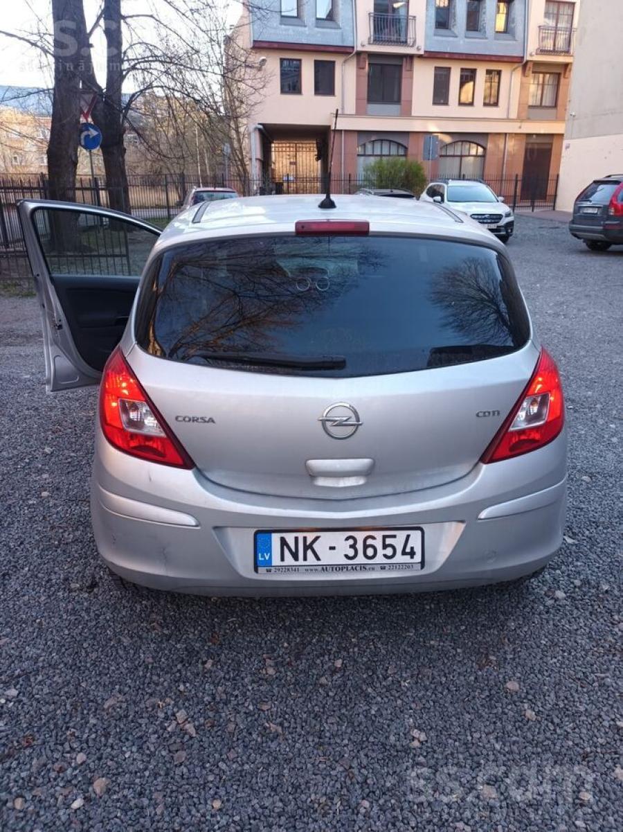 Grey Opel Corsa 2015 in Riga, with an engine capacity of 1.30 L and mileage of 250 thousand km for 2100 €, photo 4 on AUTOMOTO.COM.LV