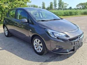 Grey Opel Corsa 2015 in Ukmerge, with an engine capacity of 1.23 L and mileage of 191 thousand km for 3650 €, photo 3 on AUTOMOTO.COM.LV