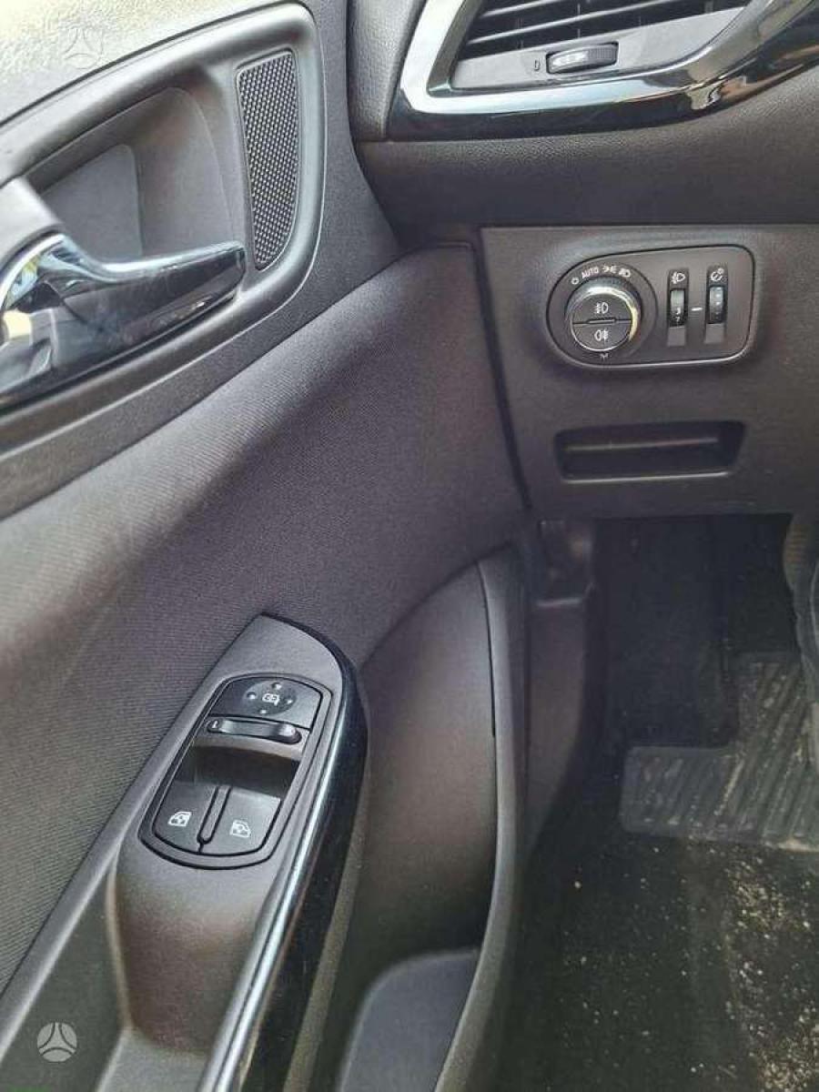 Grey Opel Corsa 2015 in Ukmerge, with an engine capacity of 1.23 L and mileage of 191 thousand km for 3650 €, photo 8 on AUTOMOTO.COM.LV