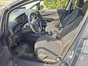 Grey Opel Corsa 2015 in Ukmerge, with an engine capacity of 1.23 L and mileage of 191 thousand km for 3650 €, photo 12 on AUTOMOTO.COM.LV
