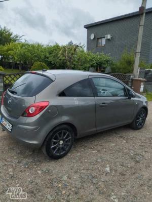 Grey Opel Corsa 2011 in Marijampole, with an engine capacity of 1.70 L and mileage of 247 thousand km for 2399 €, photo 4 on AUTOMOTO.COM.LV